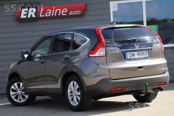 Brown Honda CR-V 2013 in Tukums, with an engine capacity of 2.20 L and mileage of 309 thousand km for 7500 €, photo 4 on AUTOMOTO.COM.LV
