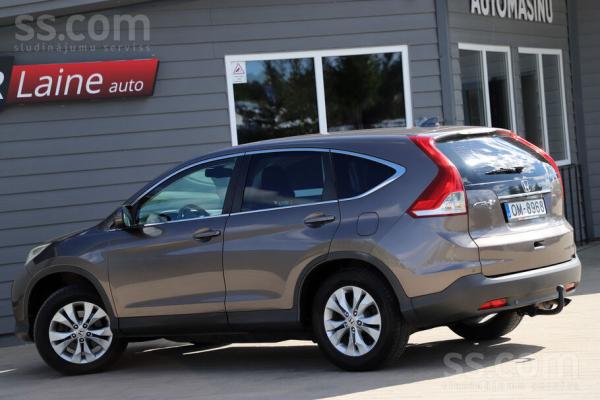 Brown Honda CR-V 2013 in Tukums, with an engine capacity of 2.20 L and mileage of 309 thousand km for 7500 €, photo 6 on AUTOMOTO.COM.LV