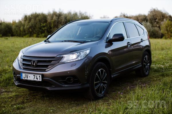 Brown Honda CR-V 2013 in Riga, with an engine capacity of 2.20 L and mileage of 507 thousand km for 7500 €, photo 1 on AUTOMOTO.COM.LV