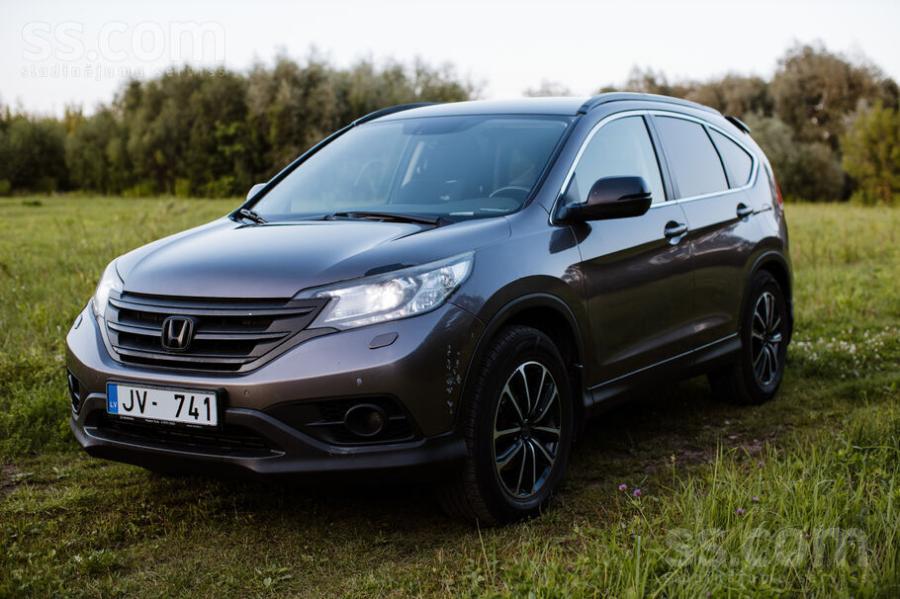 Brown Honda CR-V 2013 in Riga, with an engine capacity of 2.20 L and mileage of 507 thousand km for 7500 €, photo 1 on AUTOMOTO.COM.LV