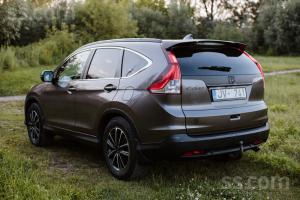 Brown Honda CR-V 2013 in Riga, with an engine capacity of 2.20 L and mileage of 507 thousand km for 7500 €, photo 4 on AUTOMOTO.COM.LV