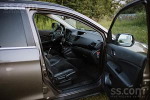 Brown Honda CR-V 2013 in Riga, with an engine capacity of 2.20 L and mileage of 507 thousand km for 7500 €, photo 8 on AUTOMOTO.COM.LV