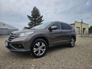 Brown Honda CR-V 2013 in Radviliskis, with an engine capacity of 2.20 L and mileage of 221 thousand km for 9900 €, photo  on AUTOMOTO.COM.LV