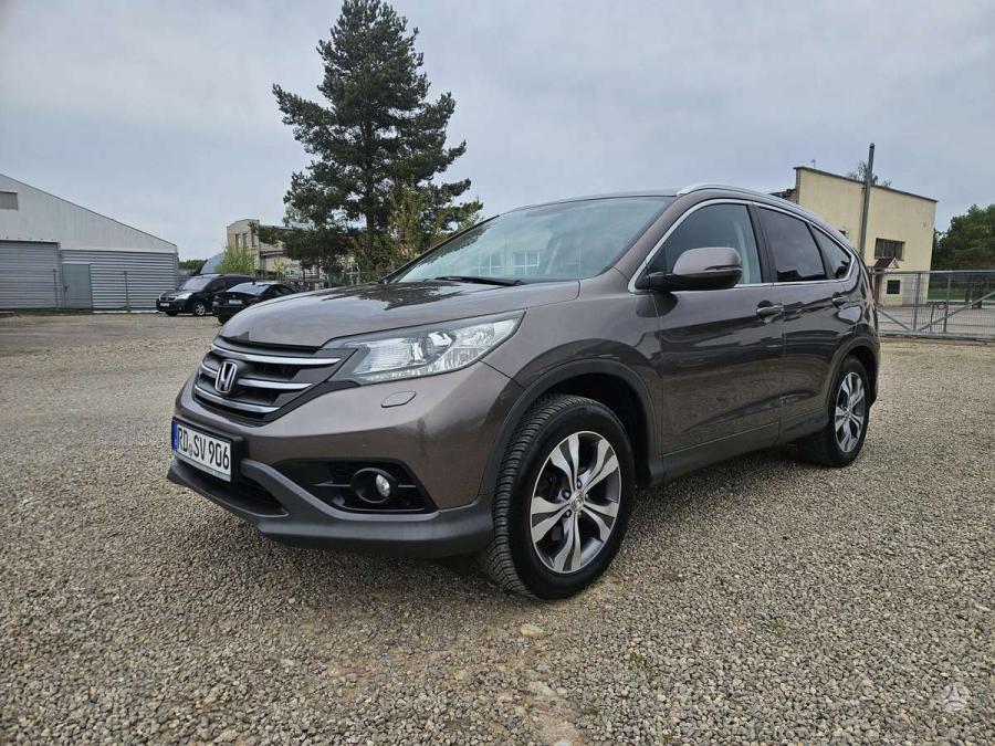 Brown Honda CR-V 2013 in Radviliskis, with an engine capacity of 2.20 L and mileage of 221 thousand km for 9900 €, photo 3 on AUTOMOTO.COM.LV