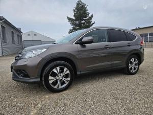 Brown Honda CR-V 2013 in Radviliskis, with an engine capacity of 2.20 L and mileage of 221 thousand km for 9900 €, photo 4 on AUTOMOTO.COM.LV