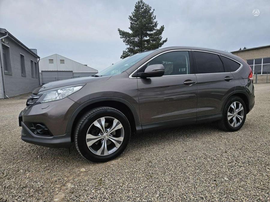 Brown Honda CR-V 2013 in Radviliskis, with an engine capacity of 2.20 L and mileage of 221 thousand km for 9900 €, photo 4 on AUTOMOTO.COM.LV