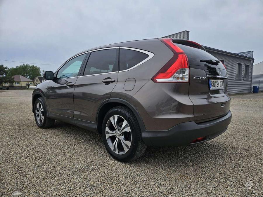 Brown Honda CR-V 2013 in Radviliskis, with an engine capacity of 2.20 L and mileage of 221 thousand km for 9900 €, photo 5 on AUTOMOTO.COM.LV