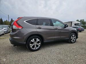Brown Honda CR-V 2013 in Radviliskis, with an engine capacity of 2.20 L and mileage of 221 thousand km for 9900 €, photo 7 on AUTOMOTO.COM.LV