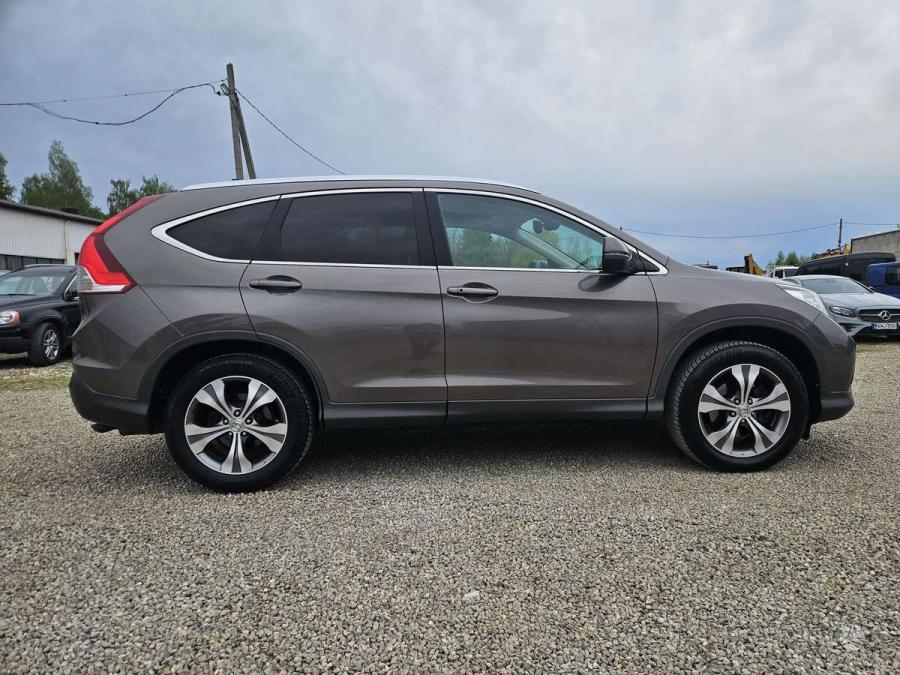 Brown Honda CR-V 2013 in Radviliskis, with an engine capacity of 2.20 L and mileage of 221 thousand km for 9900 €, photo 8 on AUTOMOTO.COM.LV