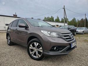 Brown Honda CR-V 2013 in Radviliskis, with an engine capacity of 2.20 L and mileage of 221 thousand km for 9900 €, photo 9 on AUTOMOTO.COM.LV