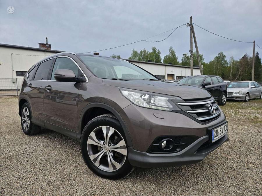 Brown Honda CR-V 2013 in Radviliskis, with an engine capacity of 2.20 L and mileage of 221 thousand km for 9900 €, photo 9 on AUTOMOTO.COM.LV