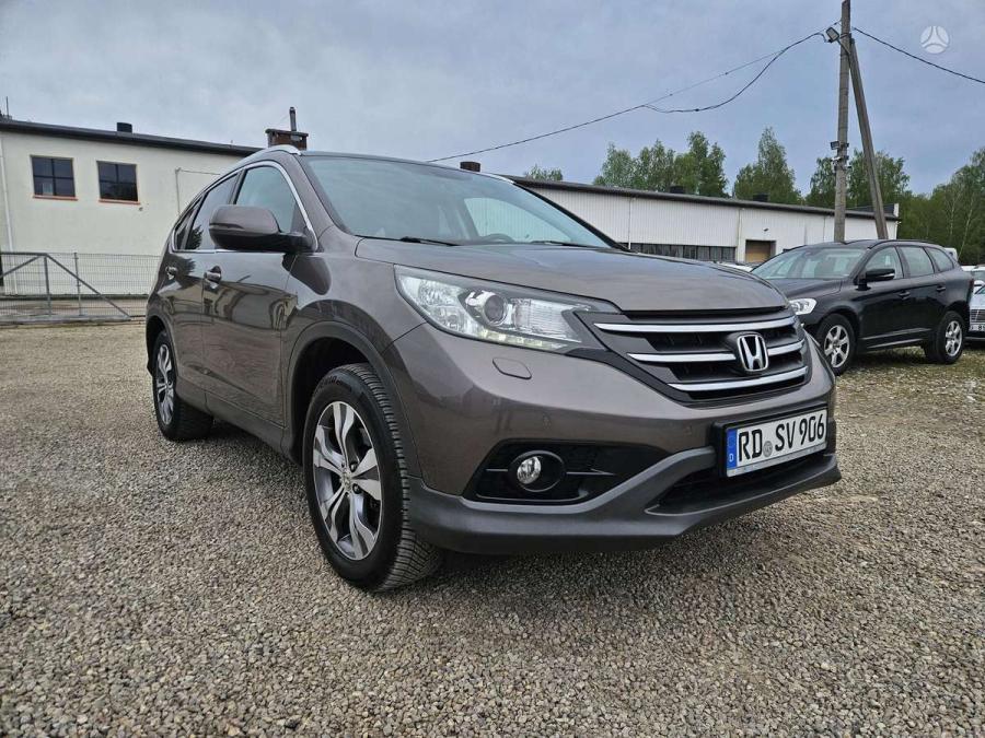 Brown Honda CR-V 2013 in Radviliskis, with an engine capacity of 2.20 L and mileage of 221 thousand km for 9900 €, photo 10 on AUTOMOTO.COM.LV