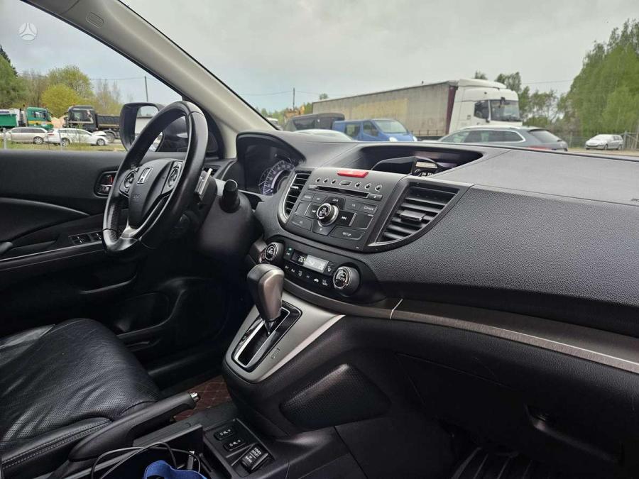 Brown Honda CR-V 2013 in Radviliskis, with an engine capacity of 2.20 L and mileage of 221 thousand km for 9900 €, photo 13 on AUTOMOTO.COM.LV