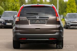 Brown Honda CR-V 2013 in Jelgava, with an engine capacity of 2.20 L and mileage of 0 thousand km for 11700 €, photo 5 on AUTOMOTO.COM.LV