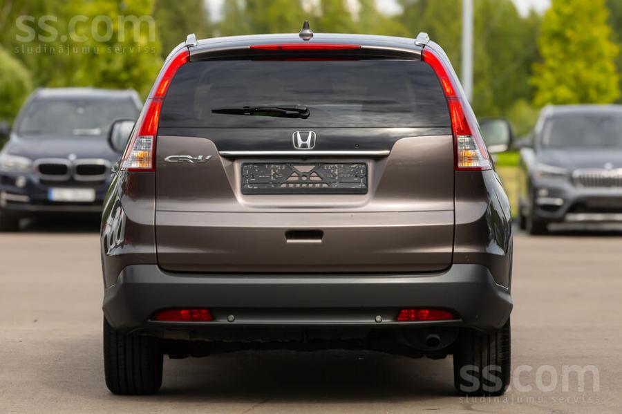 Brown Honda CR-V 2013 in Jelgava, with an engine capacity of 2.20 L and mileage of 0 thousand km for 11700 €, photo 5 on AUTOMOTO.COM.LV