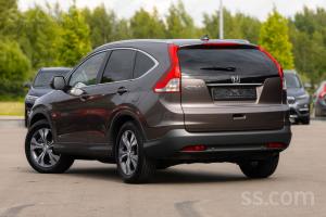 Brown Honda CR-V 2013 in Jelgava, with an engine capacity of 2.20 L and mileage of 0 thousand km for 11700 €, photo 6 on AUTOMOTO.COM.LV