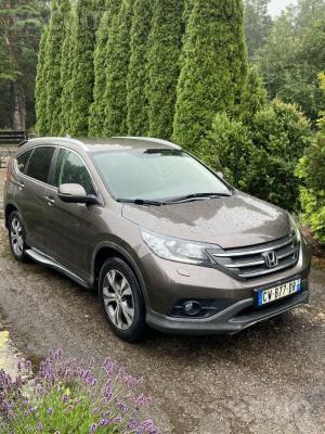 Brown Honda CR-V 2013 in Dobele, with an engine capacity of 2.20 L and mileage of 248 thousand km for 7750 €, photo  on AUTOMOTO.COM.LV