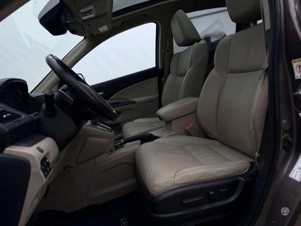 Brown Honda CR-V 2013 in Vilnius, with an engine capacity of 2.20 L and mileage of 241 thousand km for 10490 €, photo 10 on AUTOMOTO.COM.LV