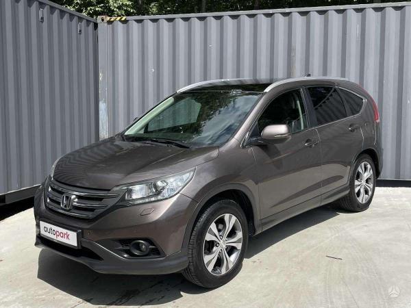 Brown Honda CR-V 2013 in Vilnius, with an engine capacity of 2.20 L and mileage of 211 thousand km for 9999 €, photo 1 on AUTOMOTO.COM.LV