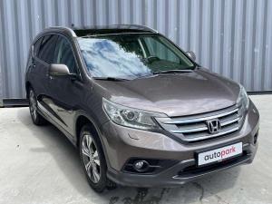 Brown Honda CR-V 2013 in Vilnius, with an engine capacity of 2.20 L and mileage of 211 thousand km for 9999 €, photo 3 on AUTOMOTO.COM.LV