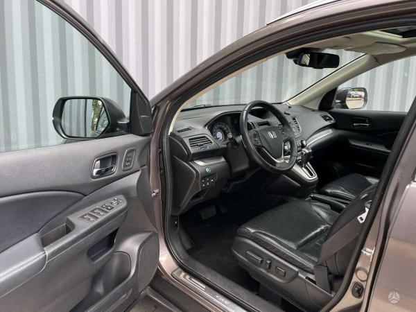 Brown Honda CR-V 2013 in Vilnius, with an engine capacity of 2.20 L and mileage of 211 thousand km for 9999 €, photo 10 on AUTOMOTO.COM.LV