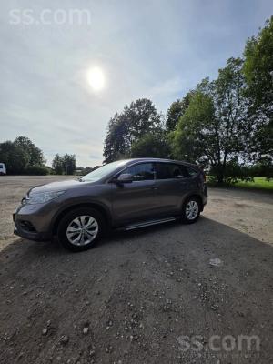 Brūns Honda CR-V 2013 Saldus, ar dzinēja tilpumu 1.60 L un nobraukumu 102 tūkst. km par 9495 €, foto 5 vietnē AUTOMOTO.COM.LV