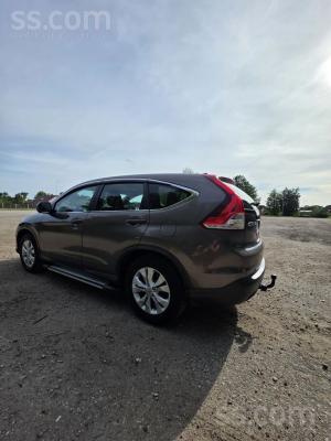 Brūns Honda CR-V 2013 Saldus, ar dzinēja tilpumu 1.60 L un nobraukumu 102 tūkst. km par 9495 €, foto 6 vietnē AUTOMOTO.COM.LV