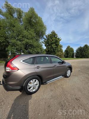 Brūns Honda CR-V 2013 Saldus, ar dzinēja tilpumu 1.60 L un nobraukumu 102 tūkst. km par 9495 €, foto 9 vietnē AUTOMOTO.COM.LV