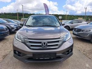 Brown Honda CR-V 2013 in Vilnius, with an engine capacity of 2.20 L and mileage of 221 thousand km for 9950 €, photo 3 on AUTOMOTO.COM.LV