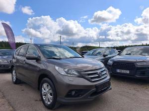 Brown Honda CR-V 2013 in Vilnius, with an engine capacity of 2.20 L and mileage of 221 thousand km for 9950 €, photo 4 on AUTOMOTO.COM.LV