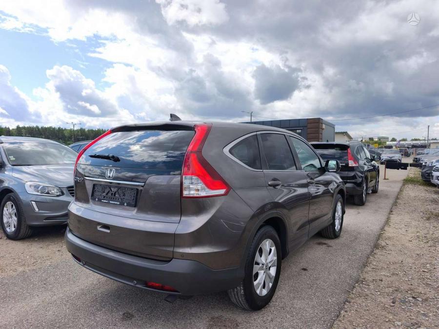 Brown Honda CR-V 2013 in Vilnius, with an engine capacity of 2.20 L and mileage of 221 thousand km for 9950 €, photo 5 on AUTOMOTO.COM.LV