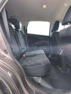 Brown Honda CR-V 2013 in Vilnius, with an engine capacity of 2.20 L and mileage of 221 thousand km for 9950 €, photo 9 on AUTOMOTO.COM.LV