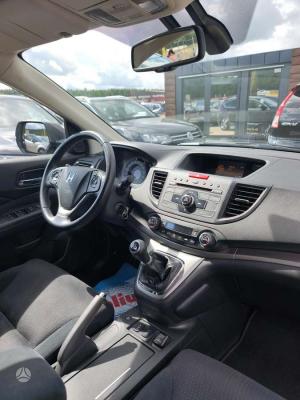 Brown Honda CR-V 2013 in Vilnius, with an engine capacity of 2.20 L and mileage of 221 thousand km for 9950 €, photo 12 on AUTOMOTO.COM.LV