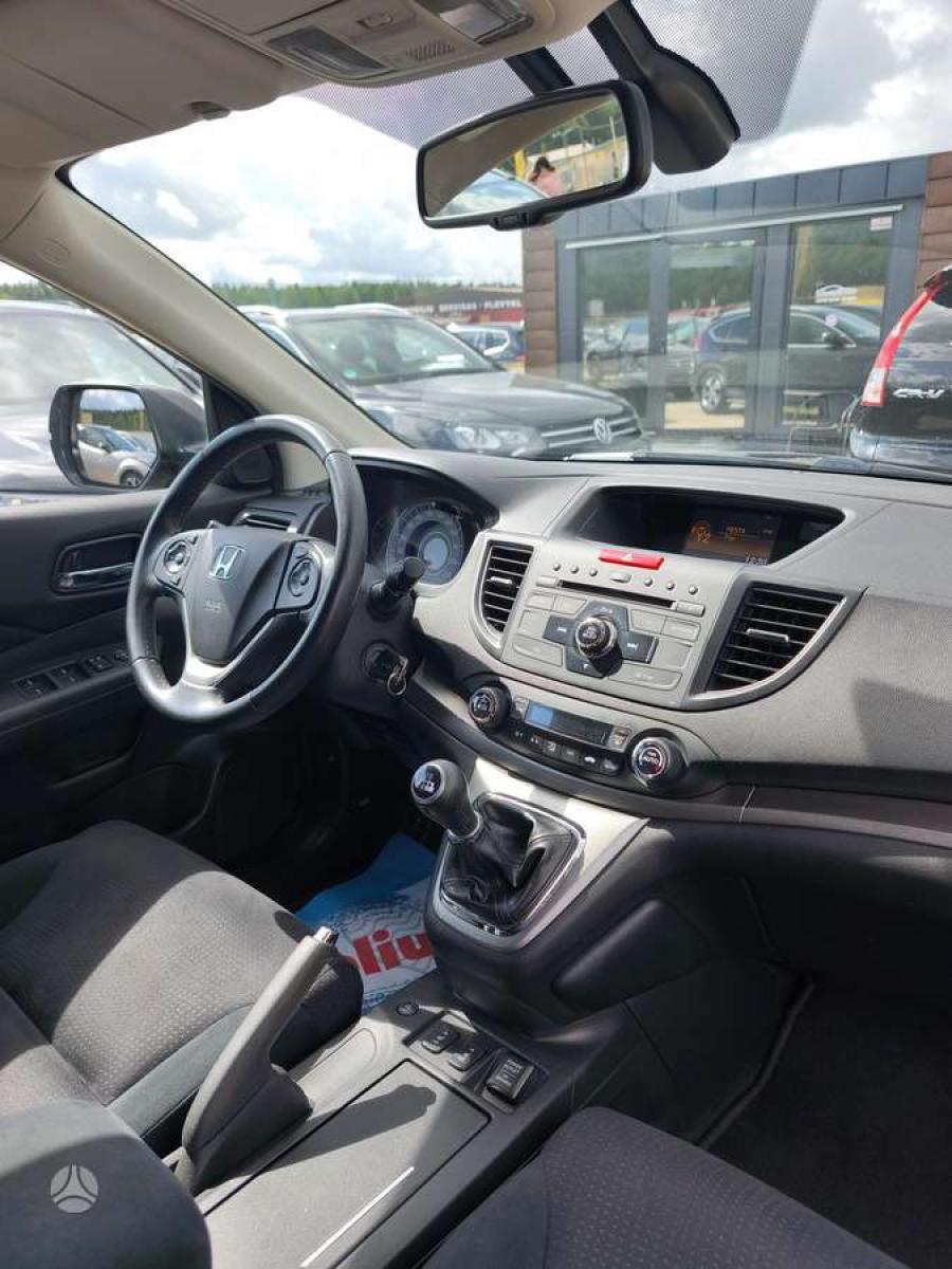 Brown Honda CR-V 2013 in Vilnius, with an engine capacity of 2.20 L and mileage of 221 thousand km for 9950 €, photo 12 on AUTOMOTO.COM.LV