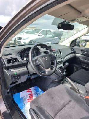Brown Honda CR-V 2013 in Vilnius, with an engine capacity of 2.20 L and mileage of 221 thousand km for 9950 €, photo 16 on AUTOMOTO.COM.LV