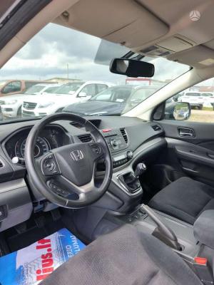 Brown Honda CR-V 2013 in Vilnius, with an engine capacity of 2.20 L and mileage of 221 thousand km for 9950 €, photo 17 on AUTOMOTO.COM.LV