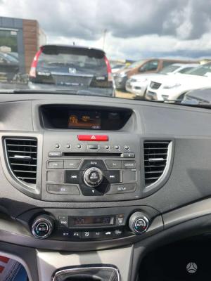 Brown Honda CR-V 2013 in Vilnius, with an engine capacity of 2.20 L and mileage of 221 thousand km for 9950 €, photo 20 on AUTOMOTO.COM.LV