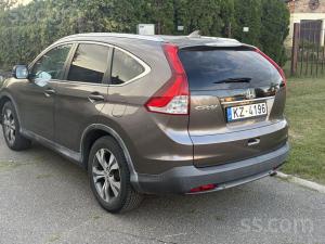Brown Honda CR-V 2013 in Riga, with an engine capacity of 2.20 L and mileage of 209 thousand km for 10500 €, photo  on AUTOMOTO.COM.LV