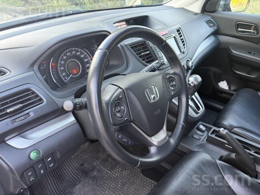 Brown Honda CR-V 2013 in Riga, with an engine capacity of 2.20 L and mileage of 209 thousand km for 10500 €, photo 7 on AUTOMOTO.COM.LV