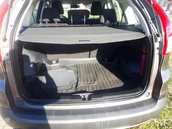 Brown Honda CR-V 2013 in Siauliai, with an engine capacity of 2.20 L and mileage of 176 thousand km for 8200 €, photo 9 on AUTOMOTO.COM.LV