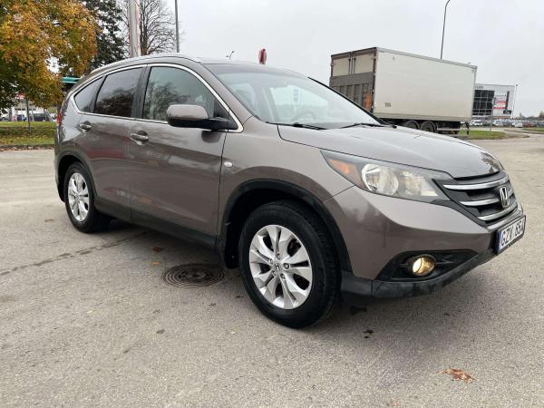 Brown Honda CR-V 2013 in Taurage, with an engine capacity of 2.35 L and mileage of 168 thousand km for 5800 €, photo 4 on AUTOMOTO.COM.LV
