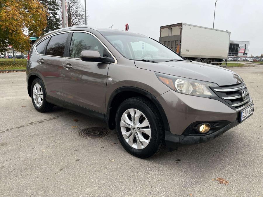 Brown Honda CR-V 2013 in Taurage, with an engine capacity of 2.35 L and mileage of 168 thousand km for 5800 €, photo 4 on AUTOMOTO.COM.LV