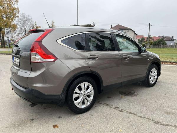 Brown Honda CR-V 2013 in Taurage, with an engine capacity of 2.35 L and mileage of 168 thousand km for 5800 €, photo 5 on AUTOMOTO.COM.LV