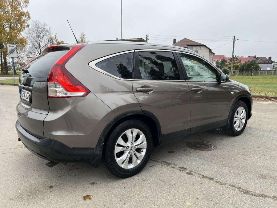 Brown Honda CR-V 2013 in Taurage, with an engine capacity of 2.35 L and mileage of 168 thousand km for 5800 €, photo 5 on AUTOMOTO.COM.LV