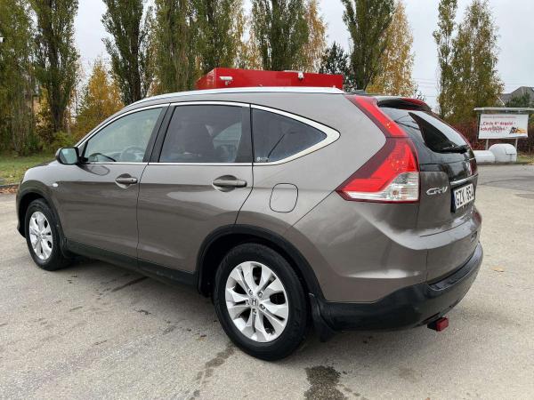 Brown Honda CR-V 2013 in Taurage, with an engine capacity of 2.35 L and mileage of 168 thousand km for 5800 €, photo 7 on AUTOMOTO.COM.LV
