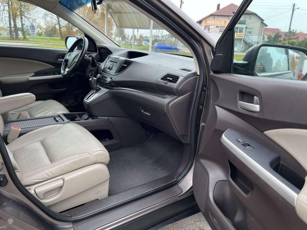 Brown Honda CR-V 2013 in Taurage, with an engine capacity of 2.35 L and mileage of 168 thousand km for 5800 €, photo 10 on AUTOMOTO.COM.LV
