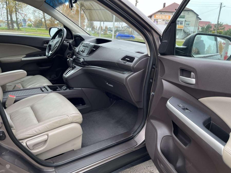 Brown Honda CR-V 2013 in Taurage, with an engine capacity of 2.35 L and mileage of 168 thousand km for 5800 €, photo 10 on AUTOMOTO.COM.LV