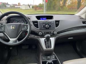 Brown Honda CR-V 2013 in Taurage, with an engine capacity of 2.35 L and mileage of 168 thousand km for 5800 €, photo 12 on AUTOMOTO.COM.LV