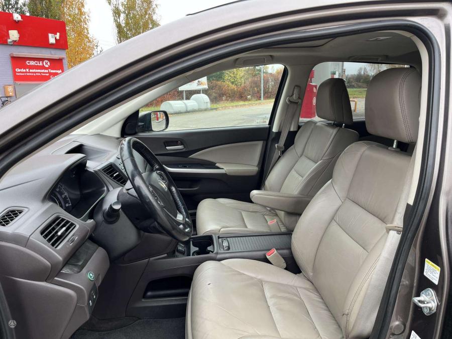 Brown Honda CR-V 2013 in Taurage, with an engine capacity of 2.35 L and mileage of 168 thousand km for 5800 €, photo 14 on AUTOMOTO.COM.LV