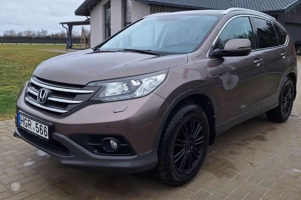 Brown Honda CR-V 2014 in Pasvalys, with an engine capacity of 1.60 L and mileage of 173 thousand km for 9800 €, photo 2 on AUTOMOTO.COM.LV